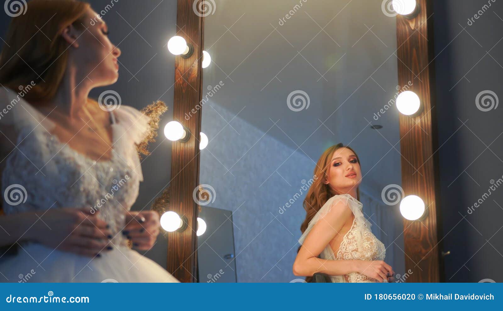 Beautiful Girl Model Posing in Front of a Mirror. Stock Photo - Image ...