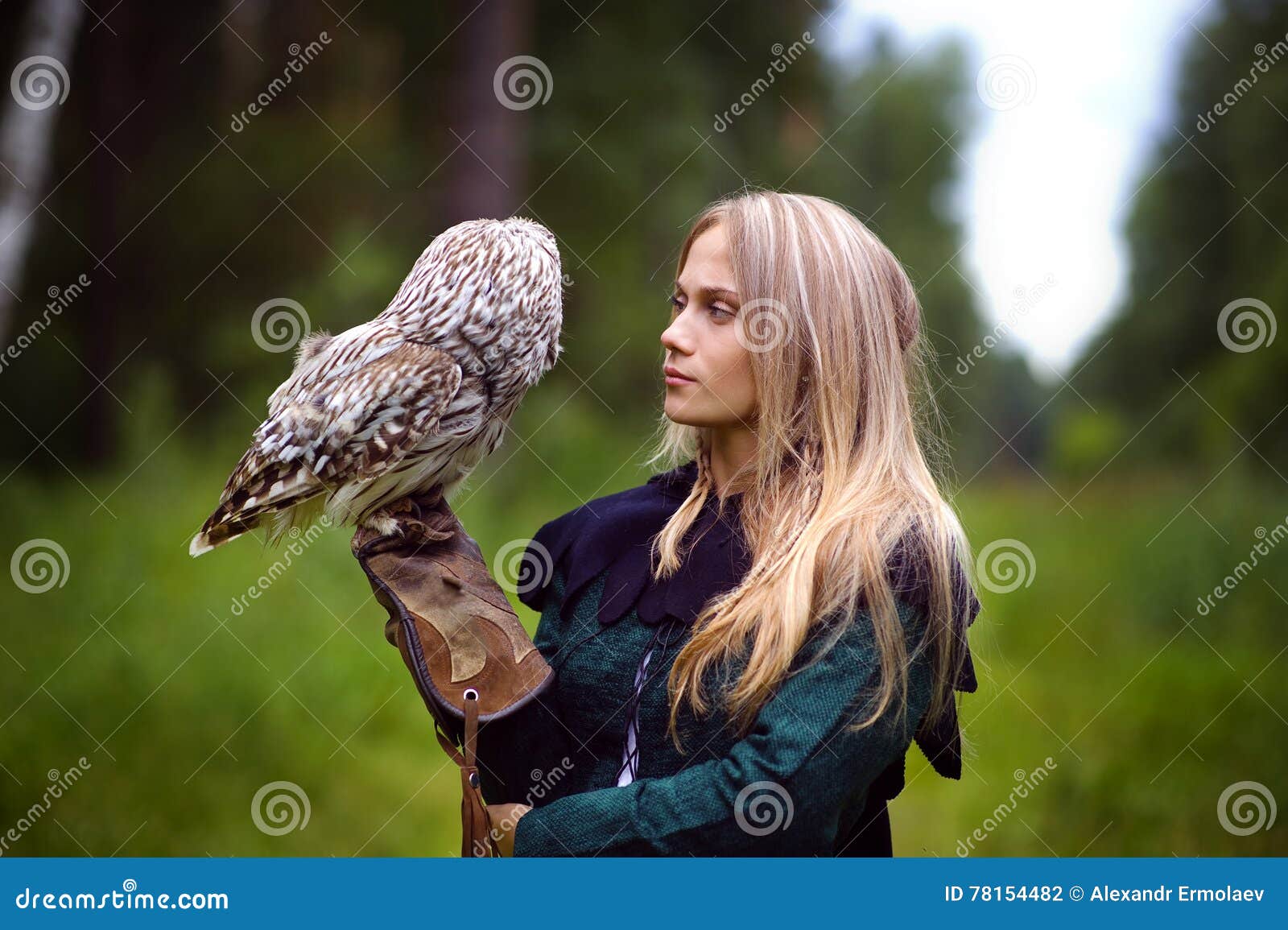 Beautiful girl with an owl stock photo. Image of costume - 78154482