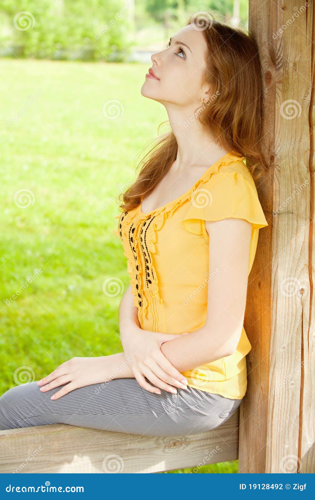 Beautiful girl in the park stock photo. Image of leans - 19128492