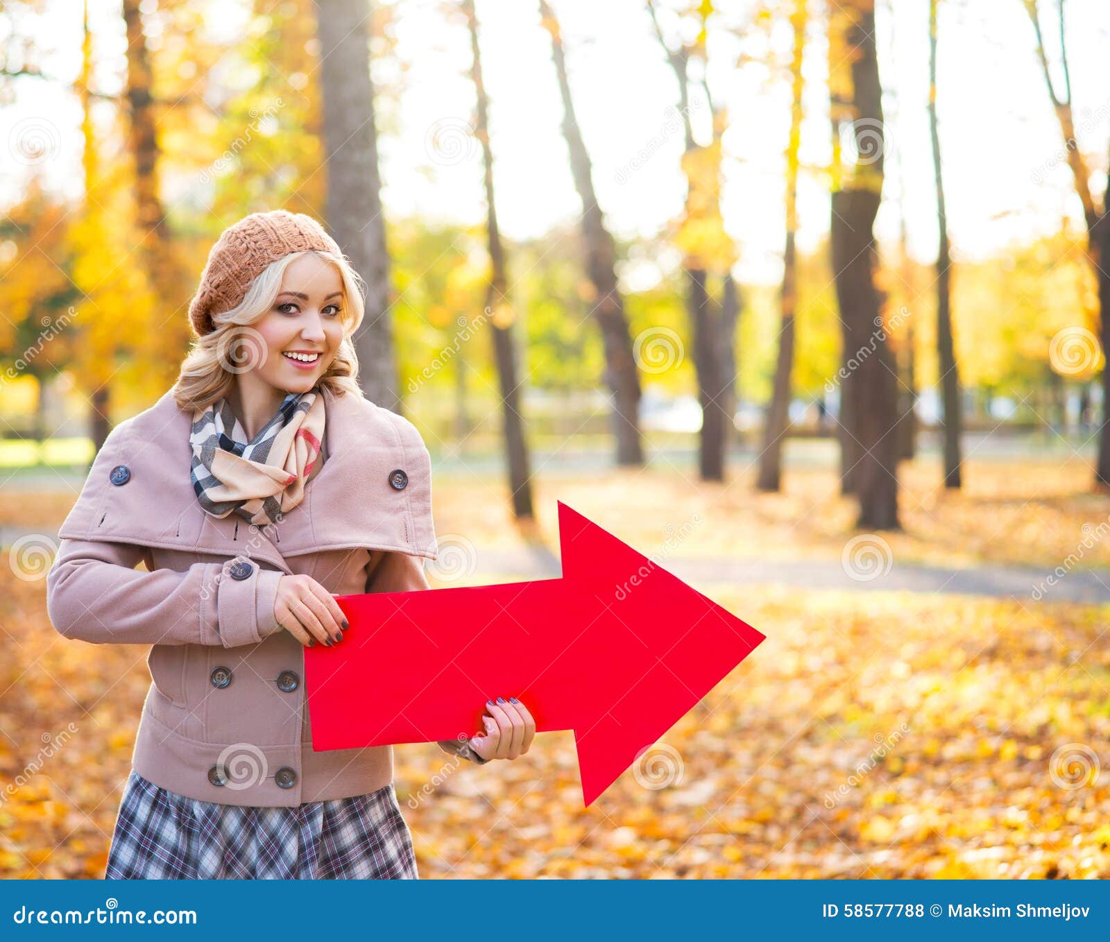 Beautiful Girl Pointing a Direction in Autumn Stock Photo - Image of ...