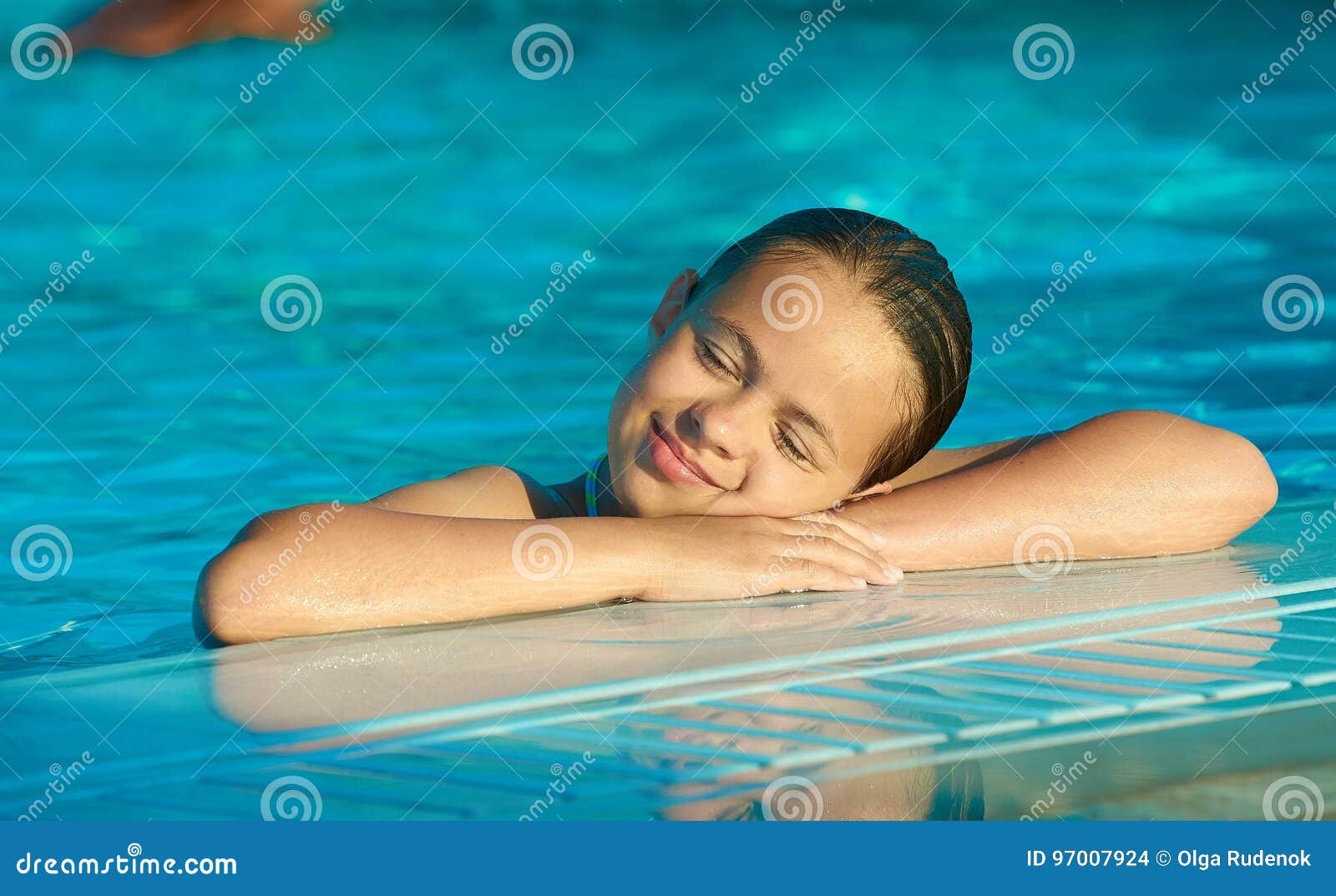 Beautiful Girl in the pool stock photo. Image of blue - 97007924