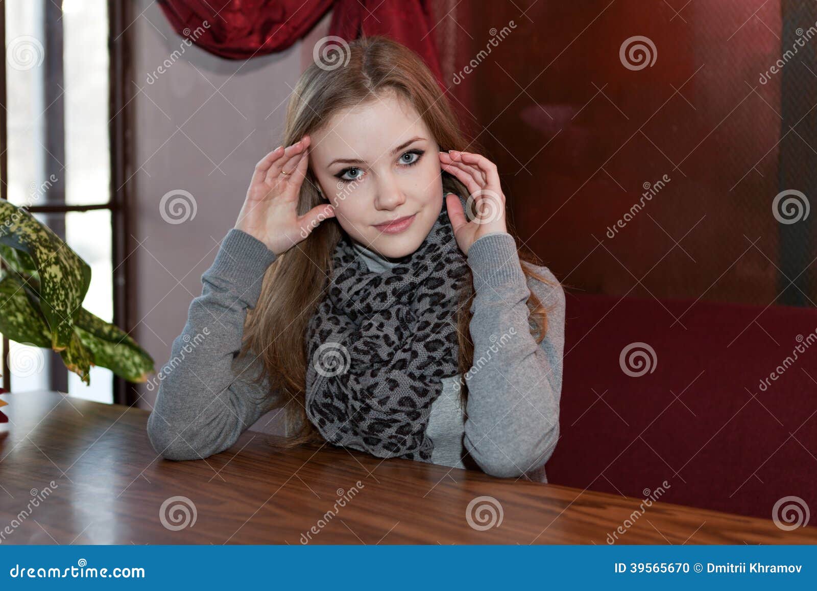Beautiful Girl Posing at Table Stock Photo - Image of expressing ...
