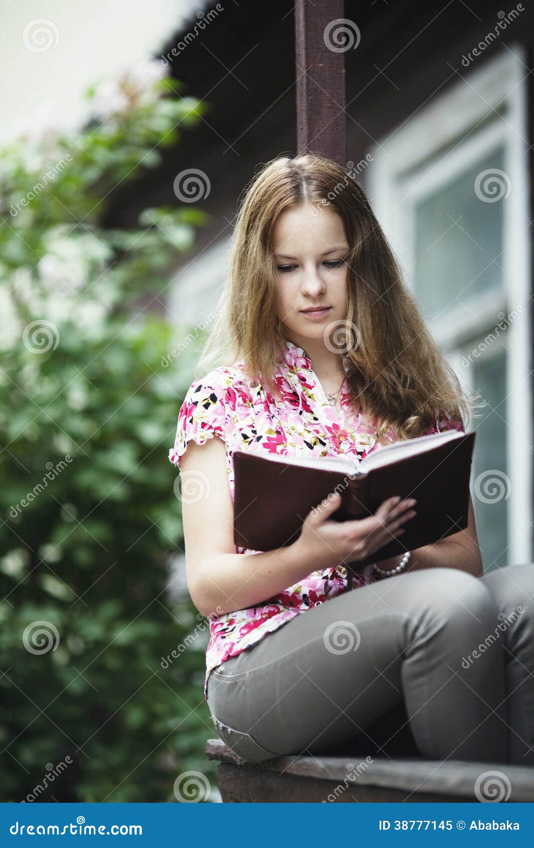 Beautiful Girl Reading Book Stock Image - Image of blond, holding: 38777145