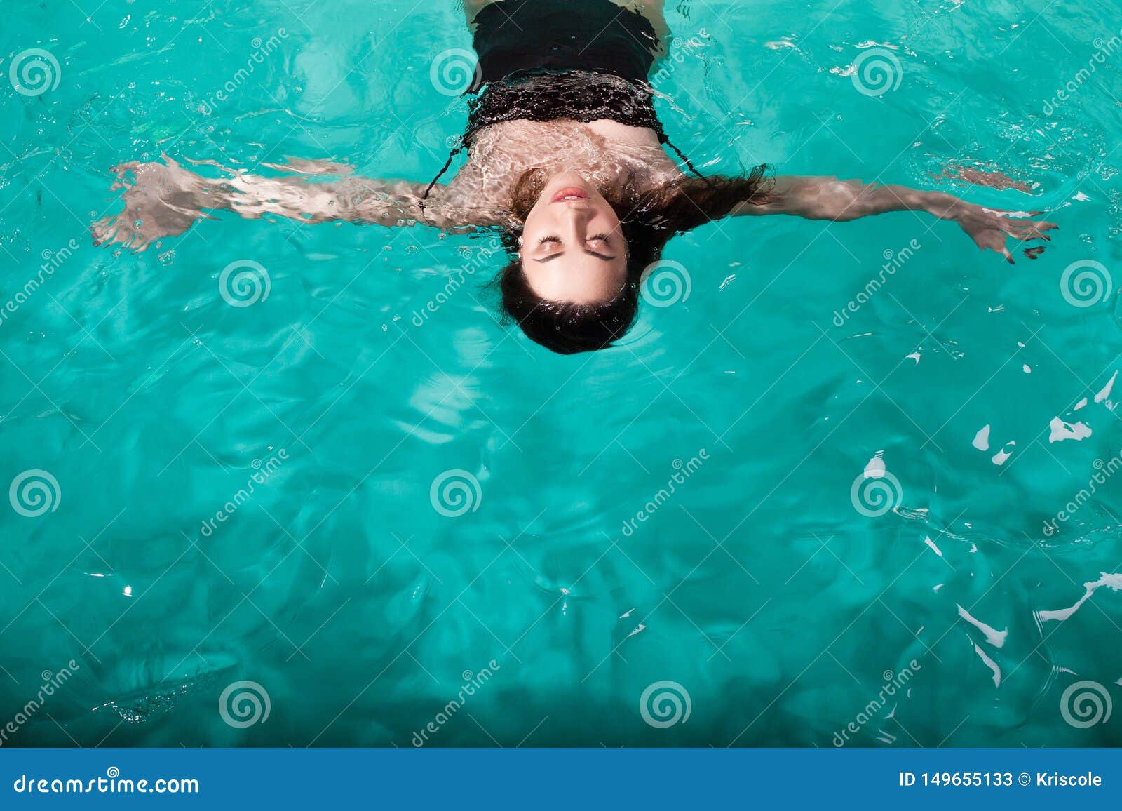 Beautiful Young Woman Swimming In The Spa Pool Swim And Relax Stock