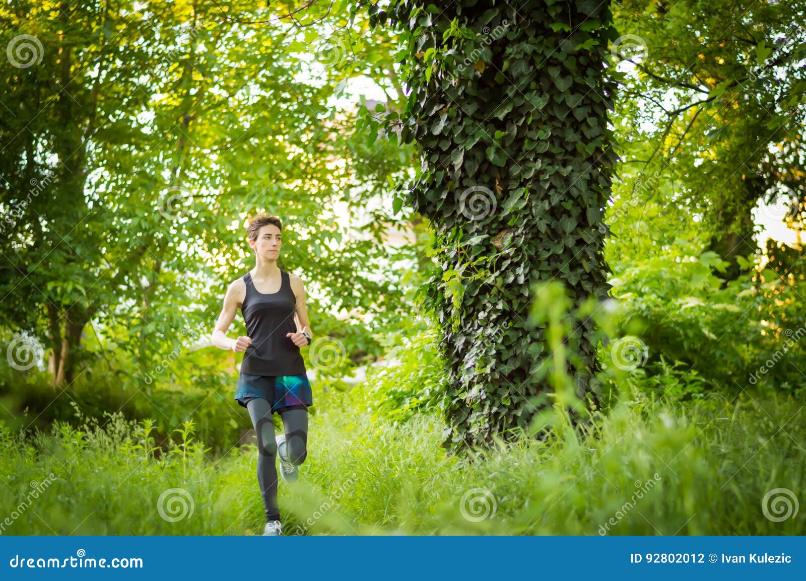 Beautiful girl running stock photo. Image of motion, forest - 92802012