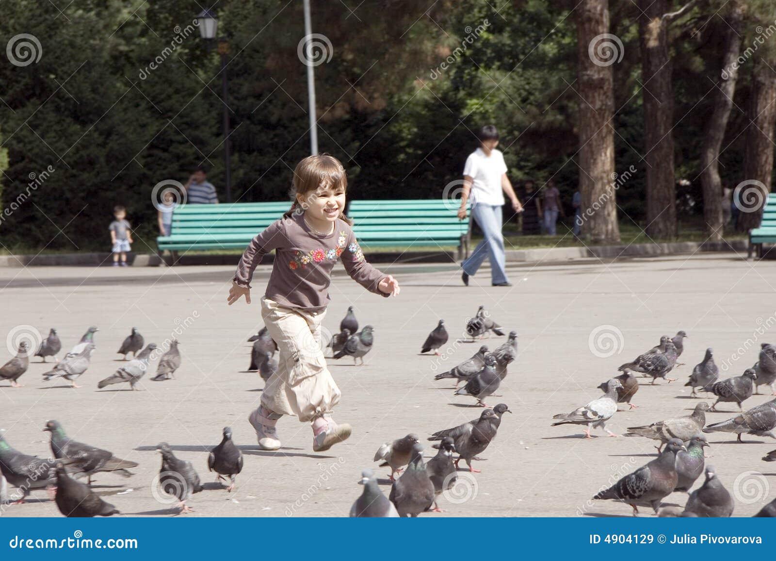 Beautiful Girl Running at Square and Pigeons Stock Image - Image of ...