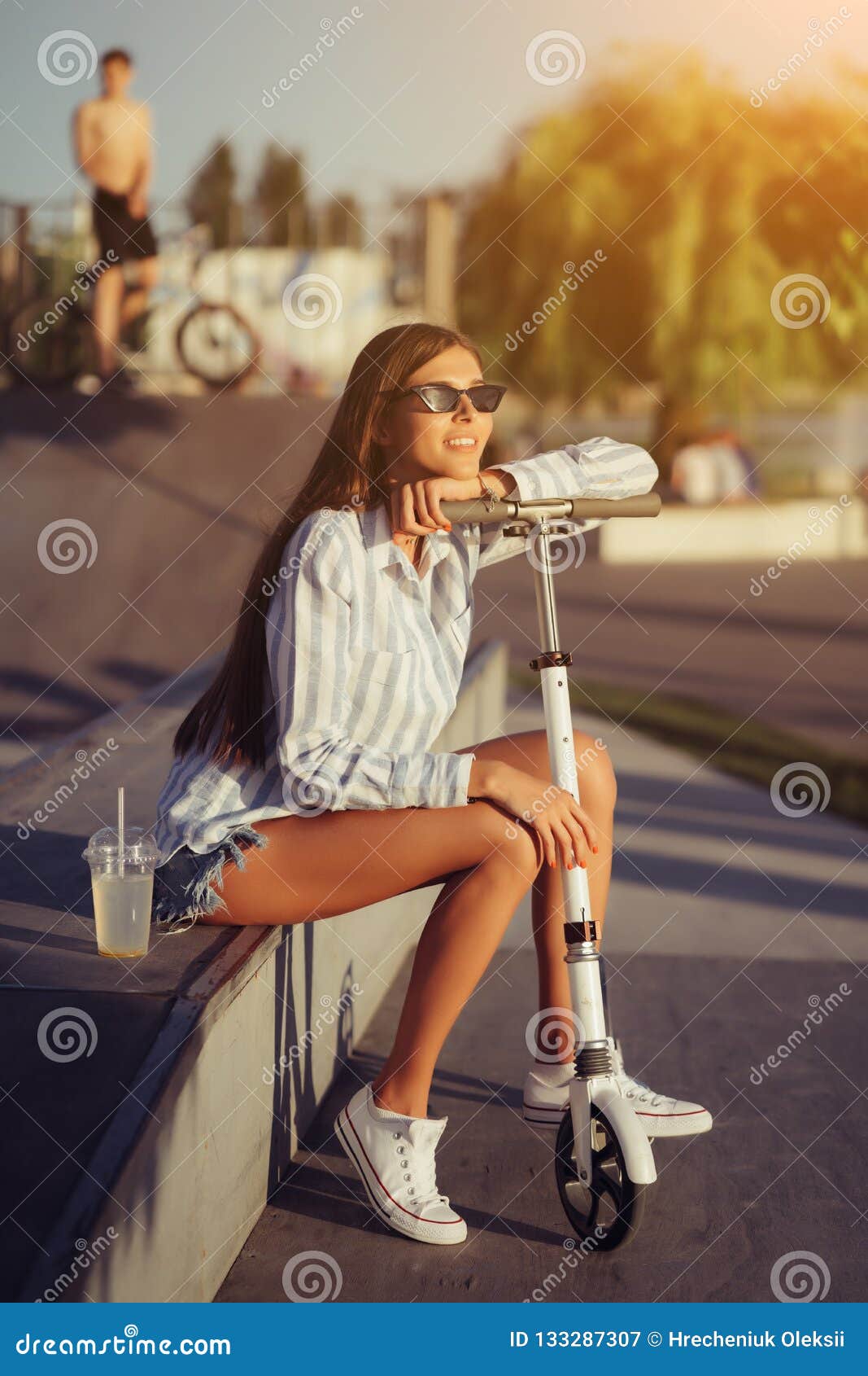 Beautiful Girl with Scooter Posing on Camera. Stock Image - Image of ...