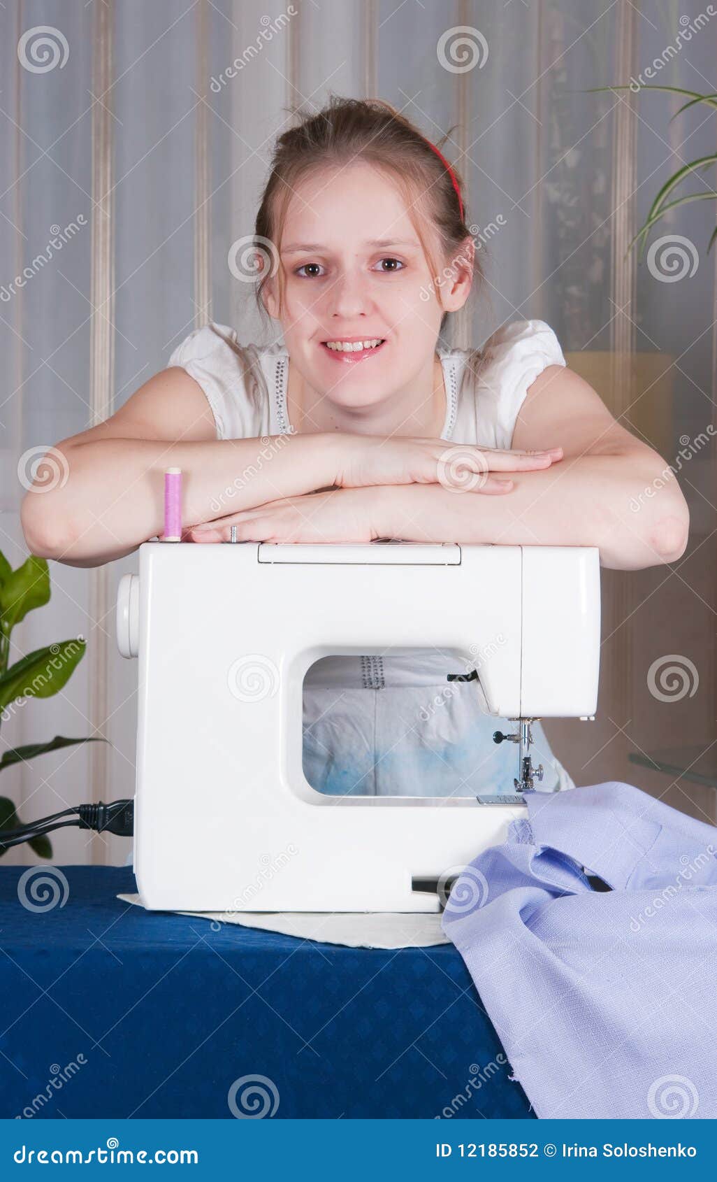 Beautiful girl sewing stock photo. Image of girl, fabric - 12185852