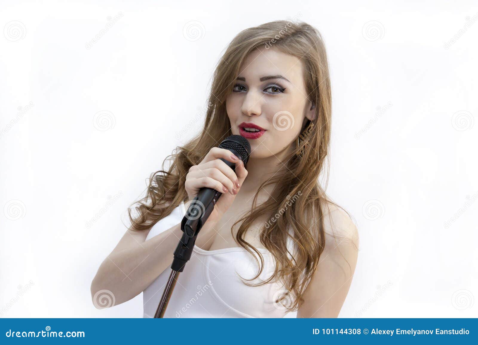 Beautiful Girl Sings in a Microphone Stock Photo - Image of gorgeous ...