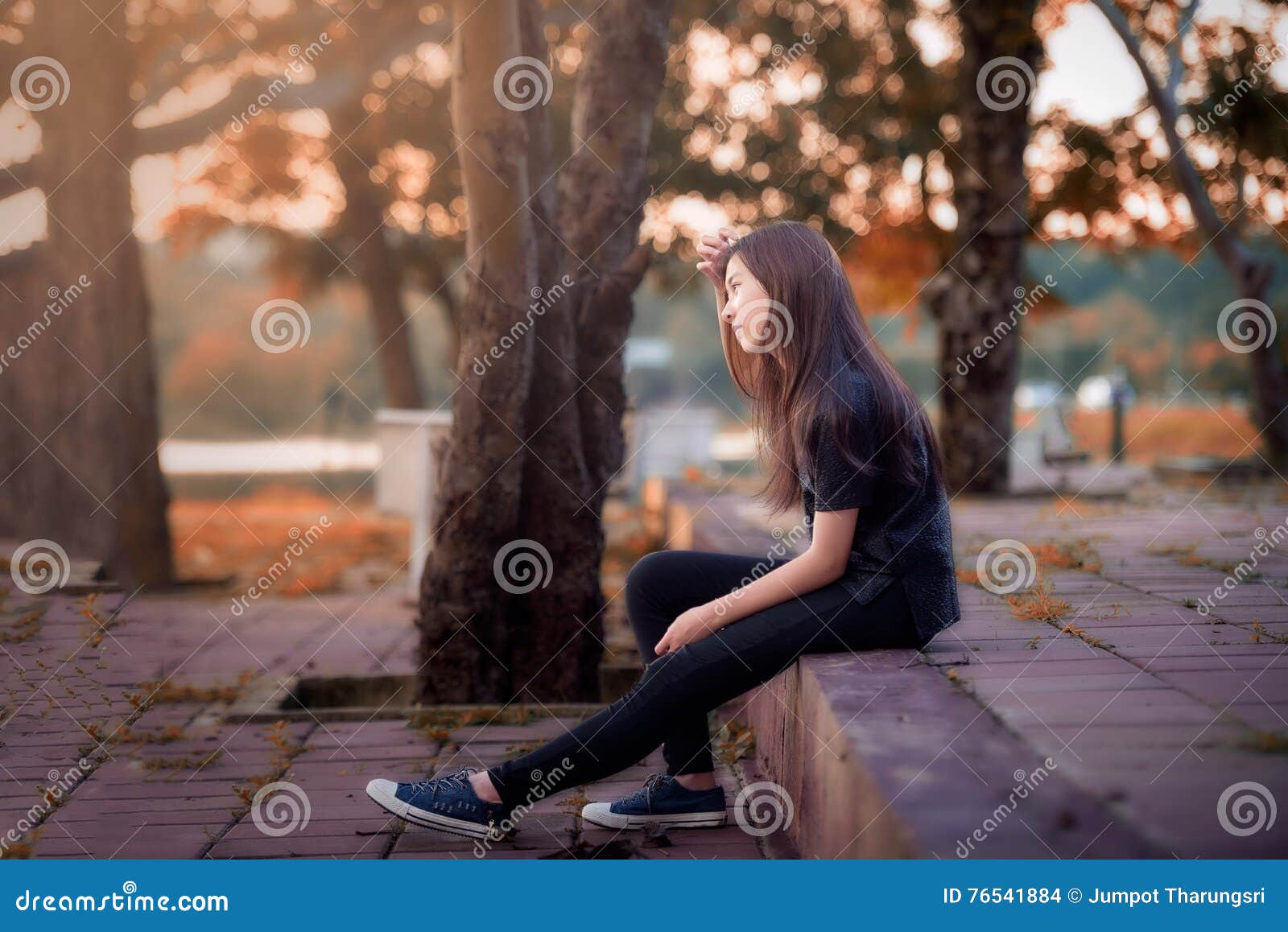 Beautiful Girl Sitting Alone Stock Photo - Image of autumn, lonely ...