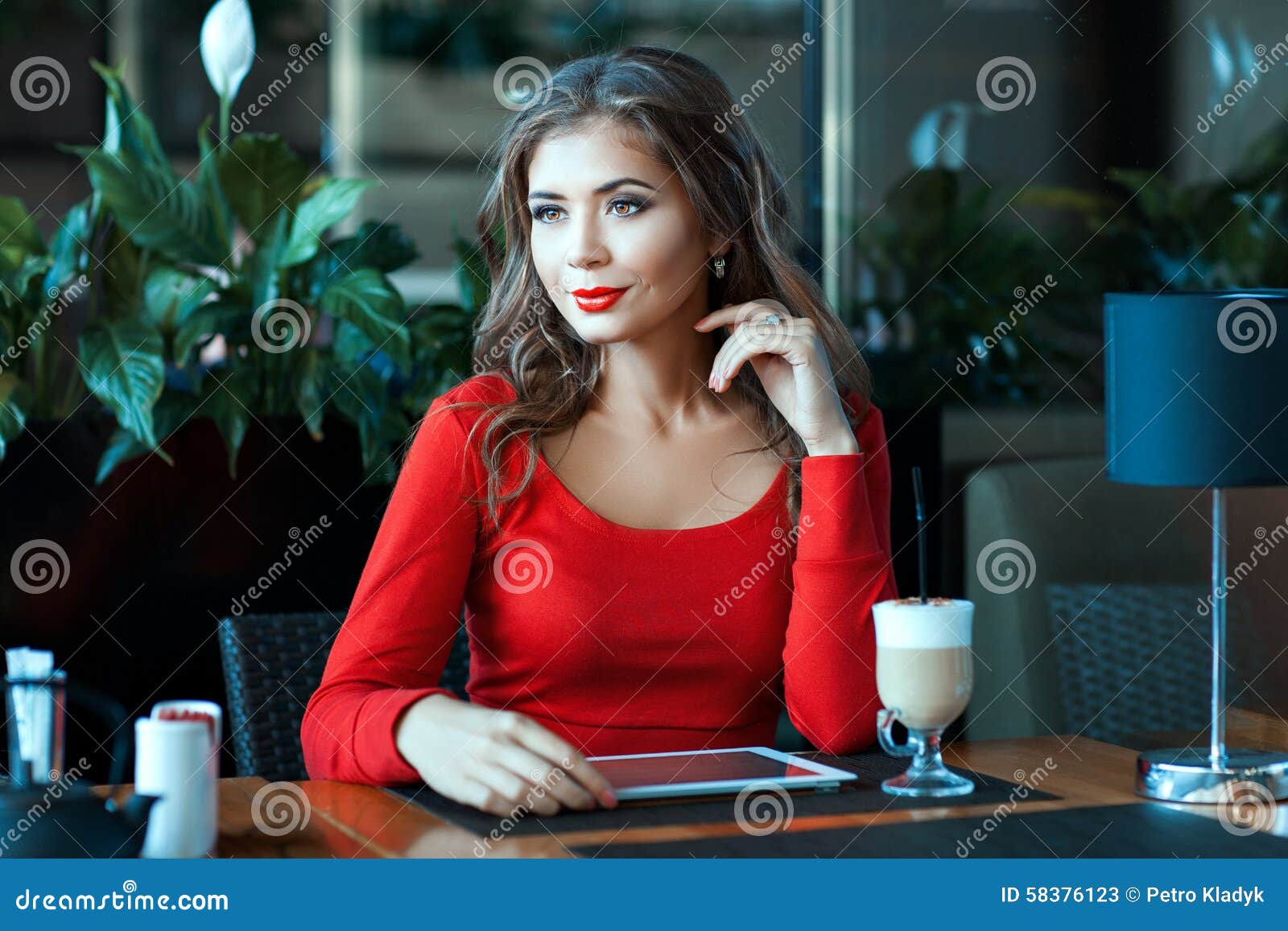 Beautiful Girl is Sitting in the Cafe and Thought. Stock Image - Image ...