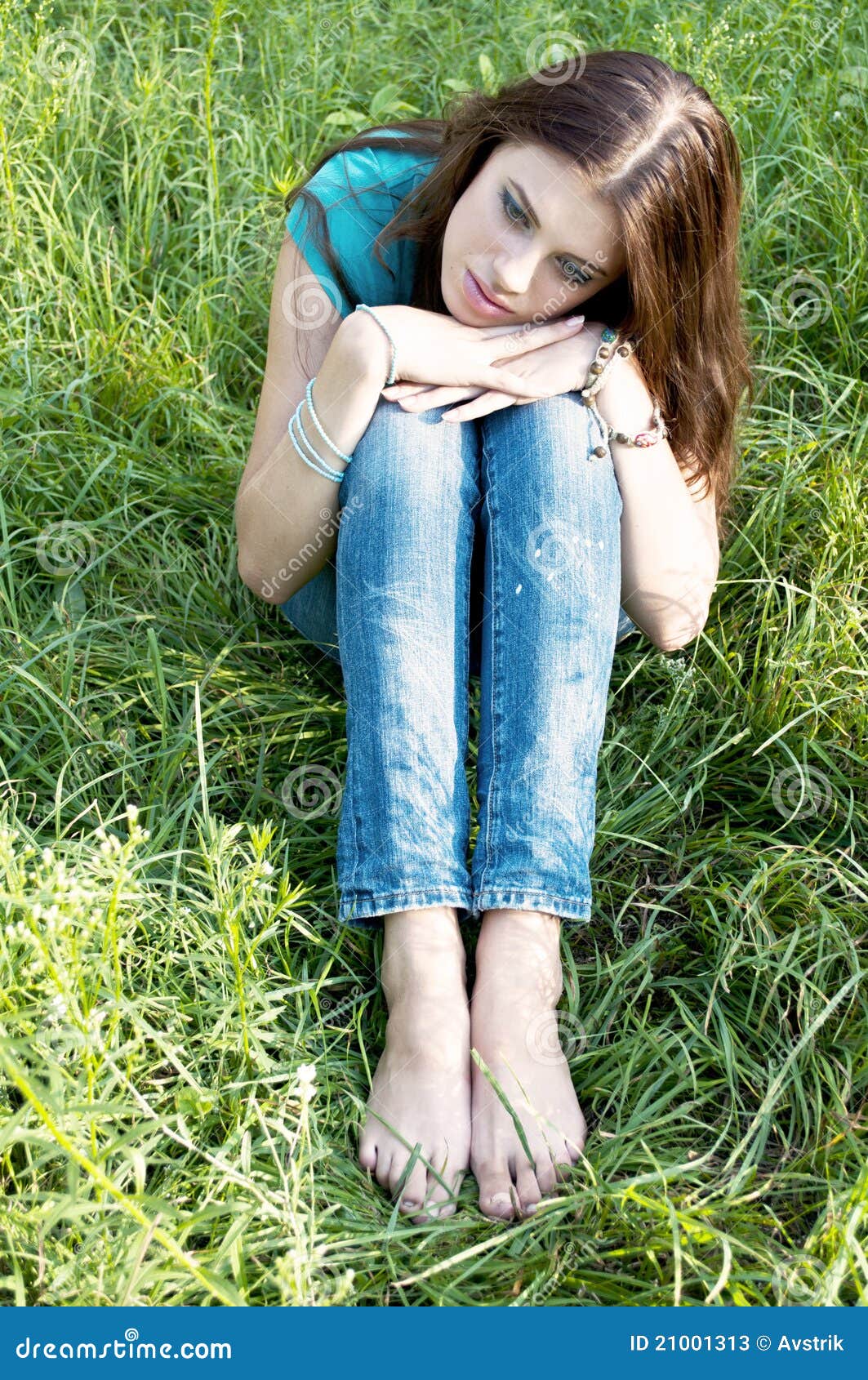 A Beautiful Girl Sitting on Grass Stock Image - Image of grass, girl ...