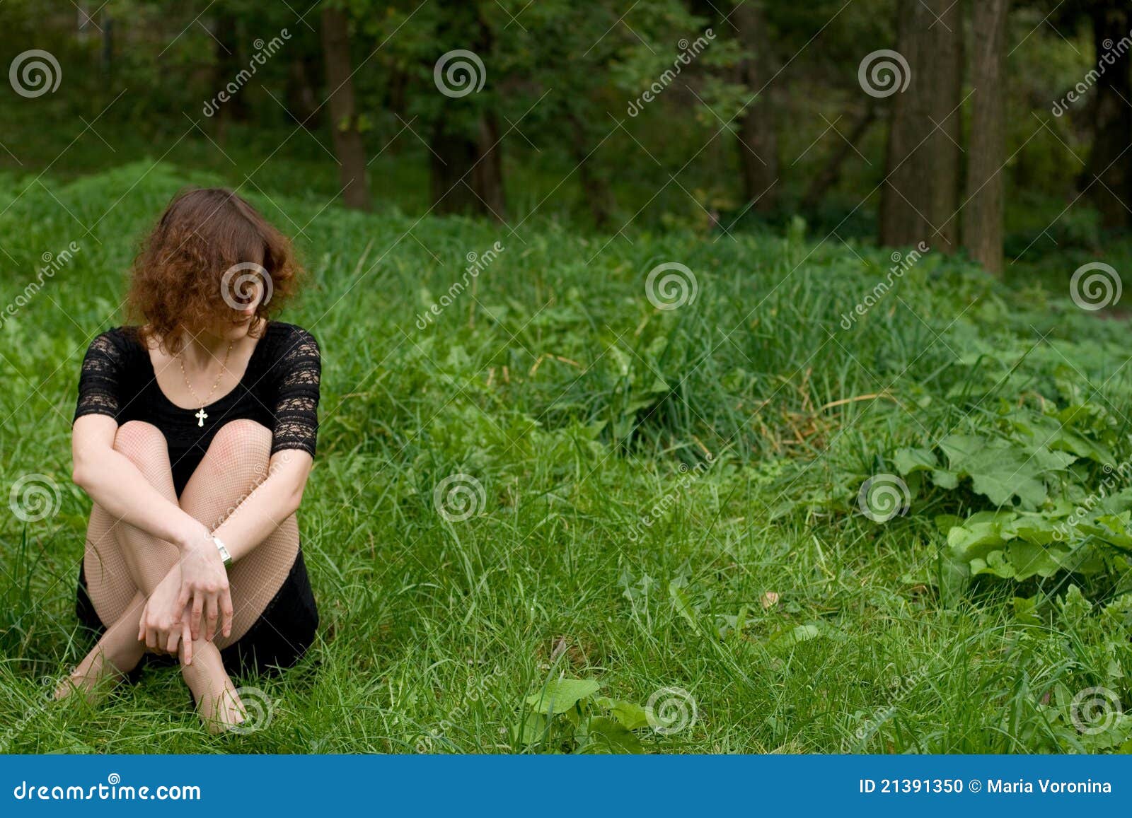 Beautiful Girl Sitting on Grass Stock Photo - Image of attractive ...