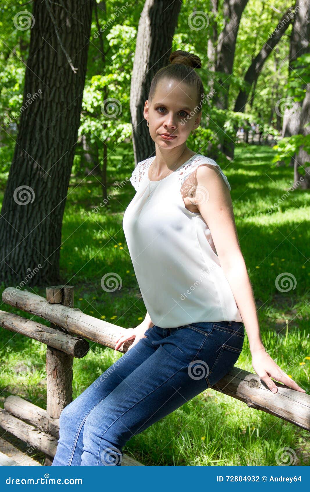 Beautiful Girl Sitting on a Log Stock Photo - Image of natural, light ...