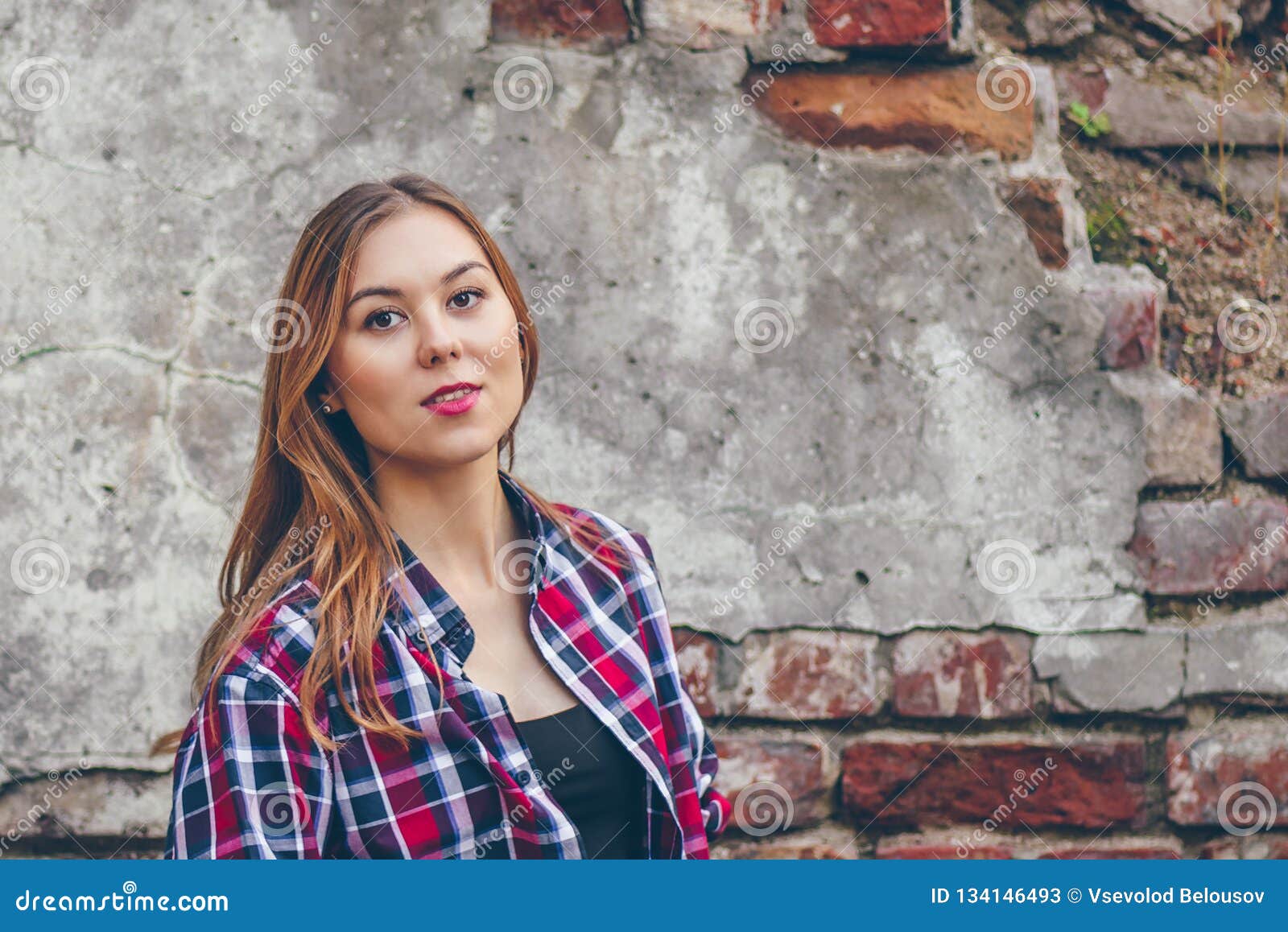 Beautiful Girl is Standing Against Brick Wall Stock Image - Image of ...