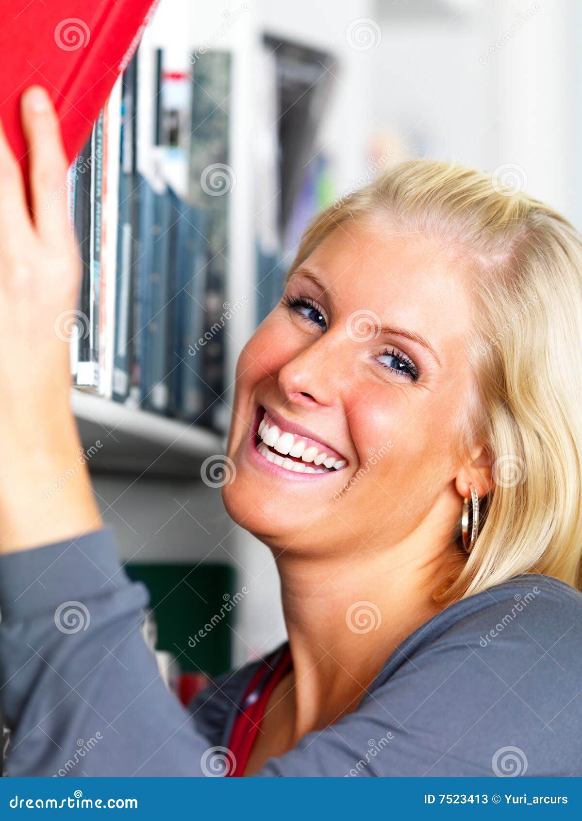 Beautiful Girl Taking a Book from Shelf in Library Stock Image - Image ...
