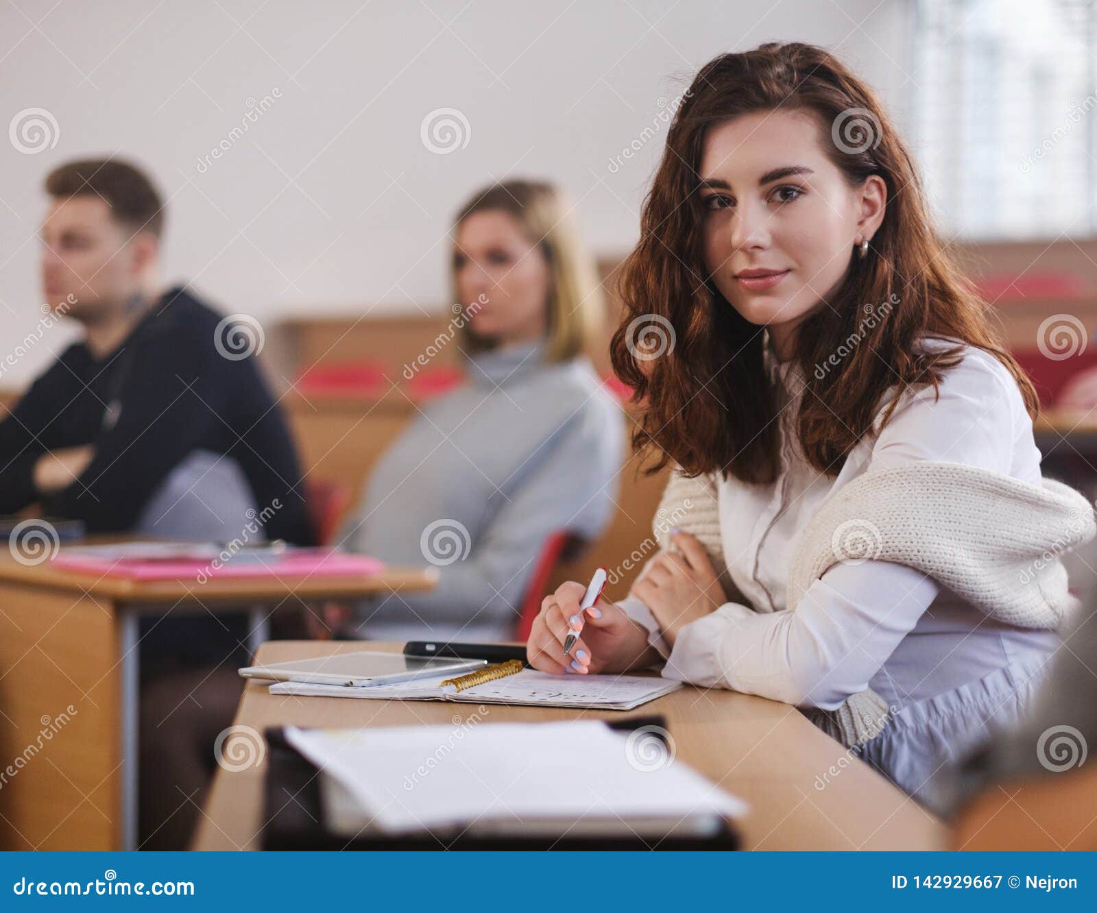 Beautiful Girl Taking Notes in Multinational Group of Students in an ...