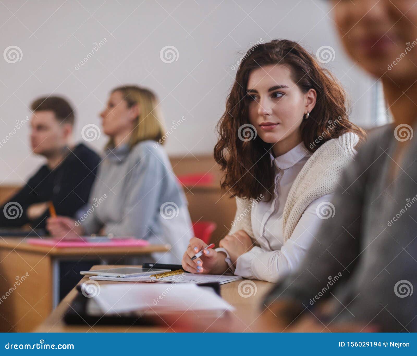 Beautiful Girl Taking Notes in Multinational Group of Students in an ...