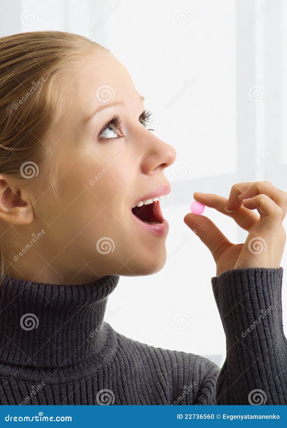A Beautiful Girl Taking a Tablet Stock Photo - Image of health ...