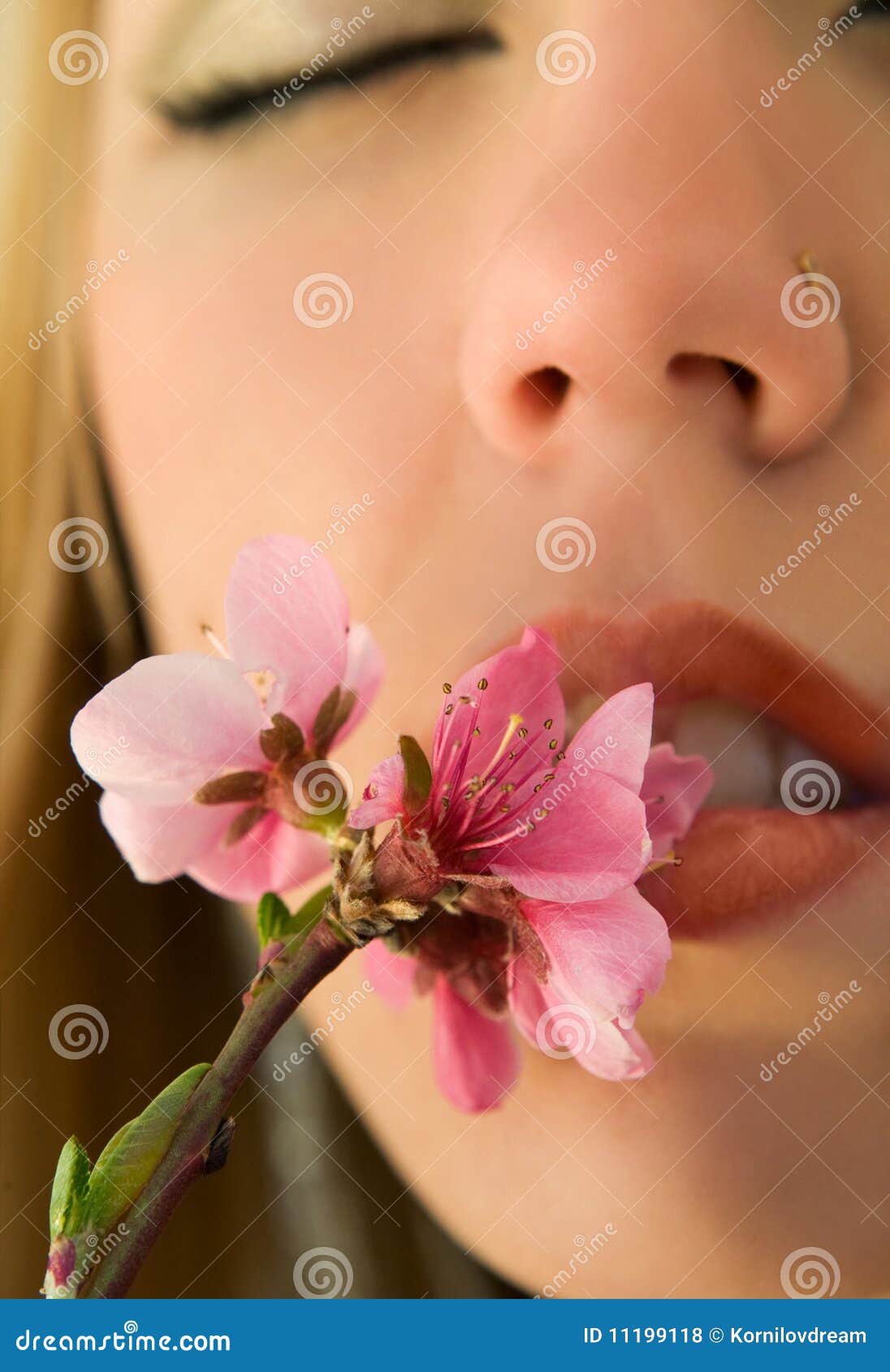 Beautiful Girl Tasting Flower Stock Photo - Image of girl, close: 11199118