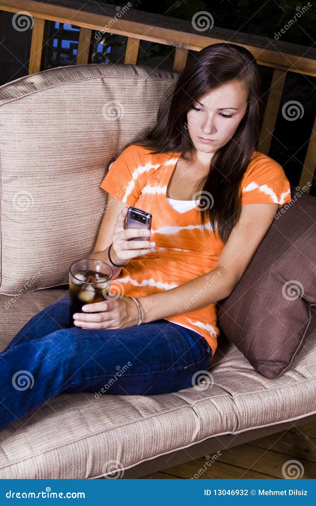 Beautiful Girl Texting in the Patio Stock Photo - Image of deck, female ...