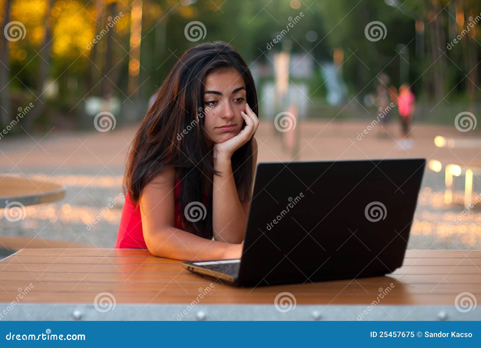 Beautiful Girl Using Her Laptop - Thinking Stock Image - Image of alone ...