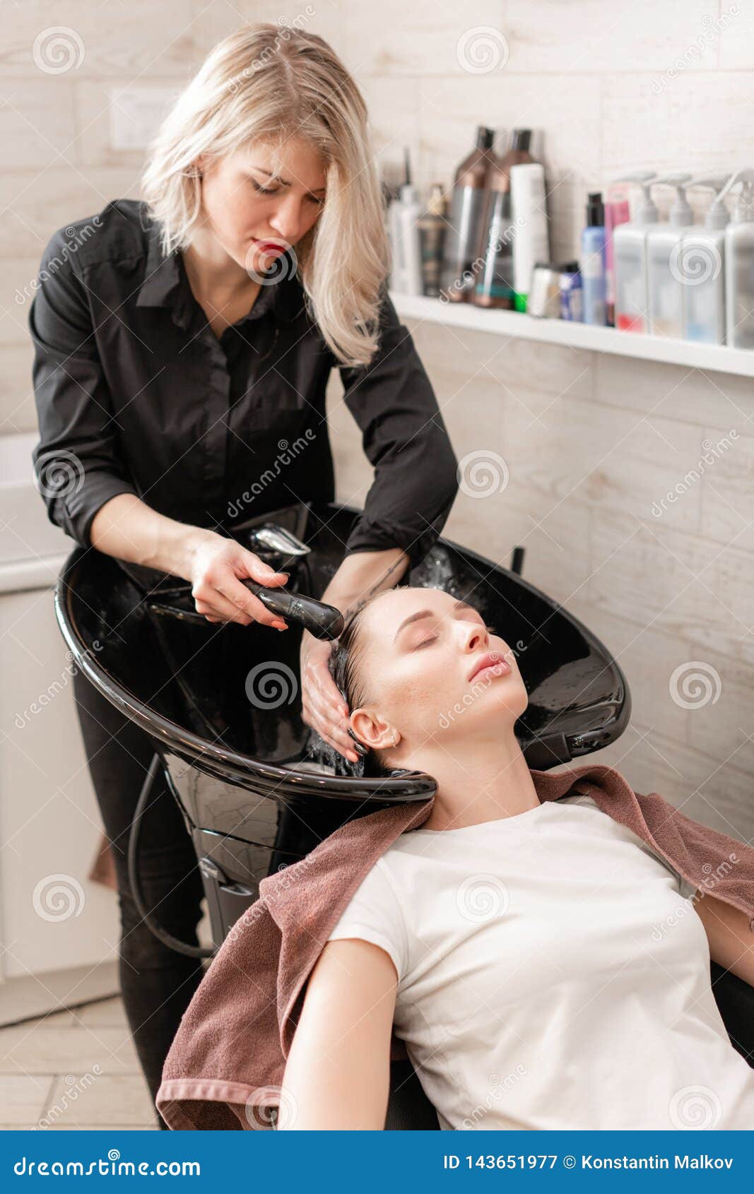 Beautiful Girl Washes Her Hair Before A Haircut In A Beauty Salon Hair