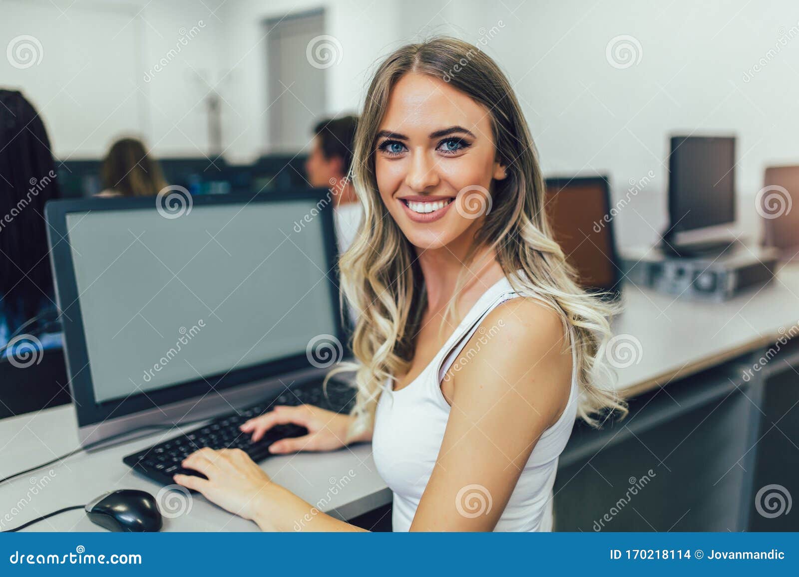 Beautiful Girl Working on a Computer in a Classroom Stock Photo - Image ...