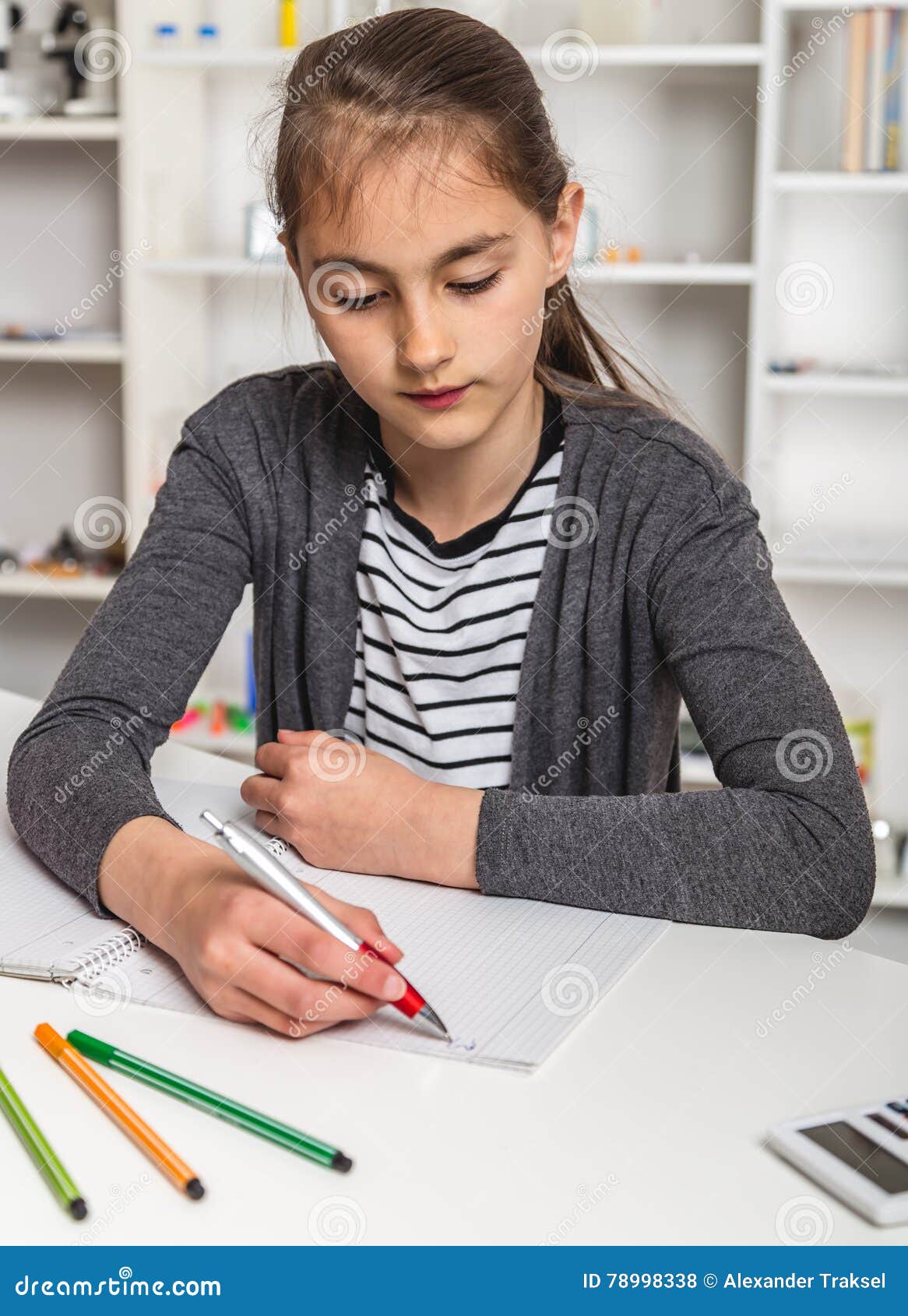Beautiful Girl Working on Her School Project at Home. Stock Photo ...