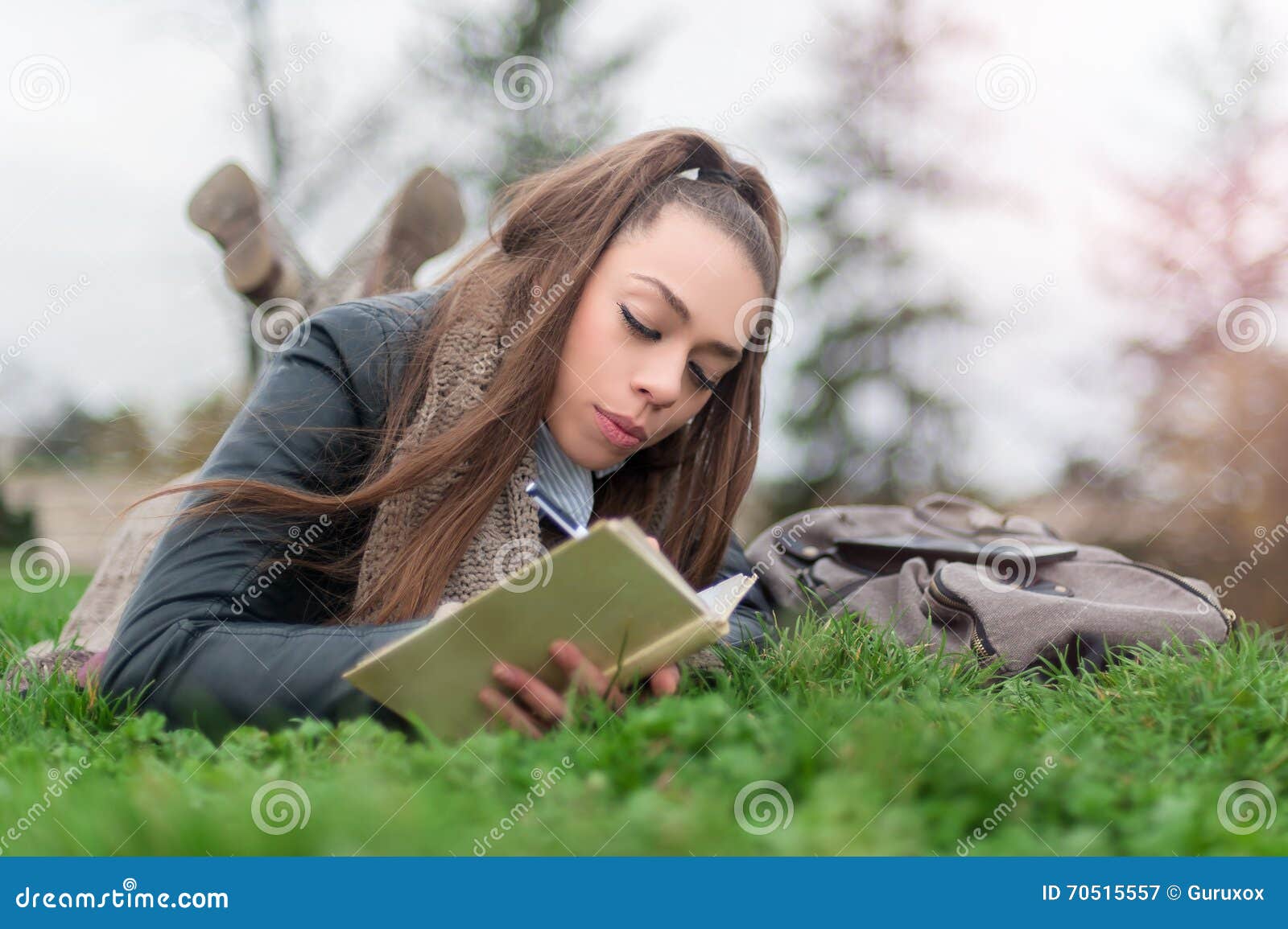Beautiful Girl Writing in a Book Stock Image - Image of enjoying ...