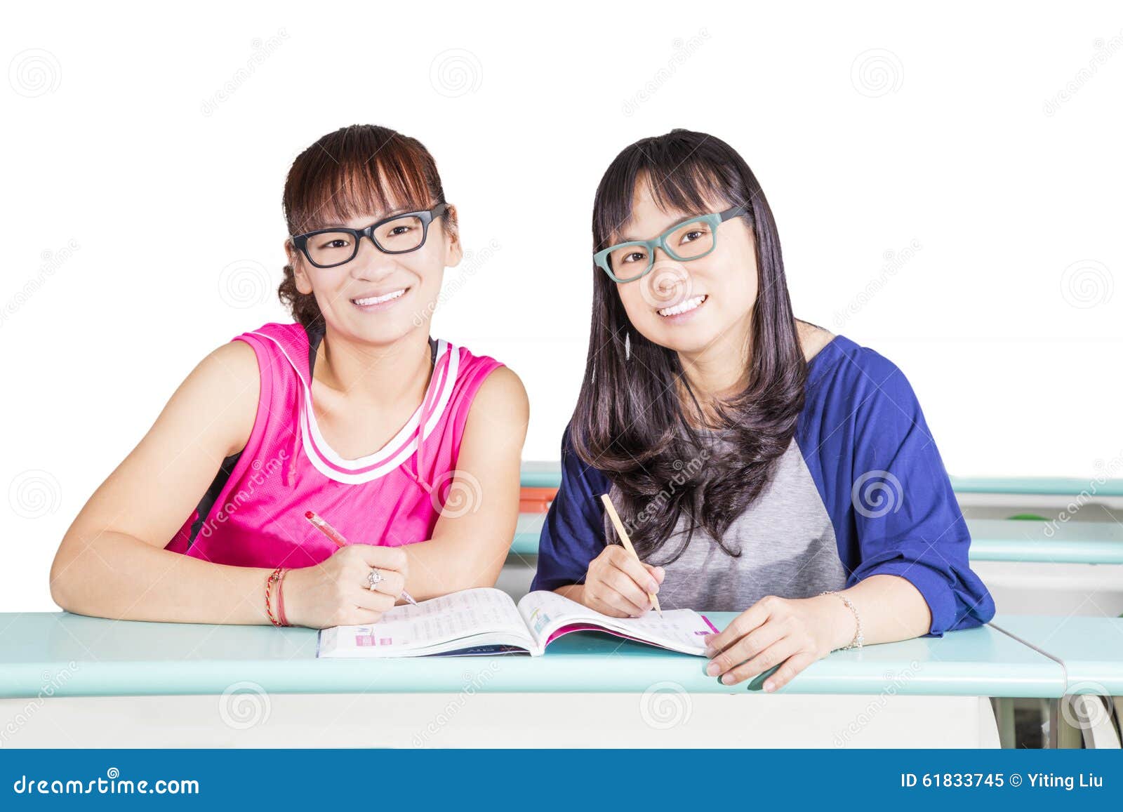 Beautiful Girls Learning at Classroom Stock Image - Image of adult ...