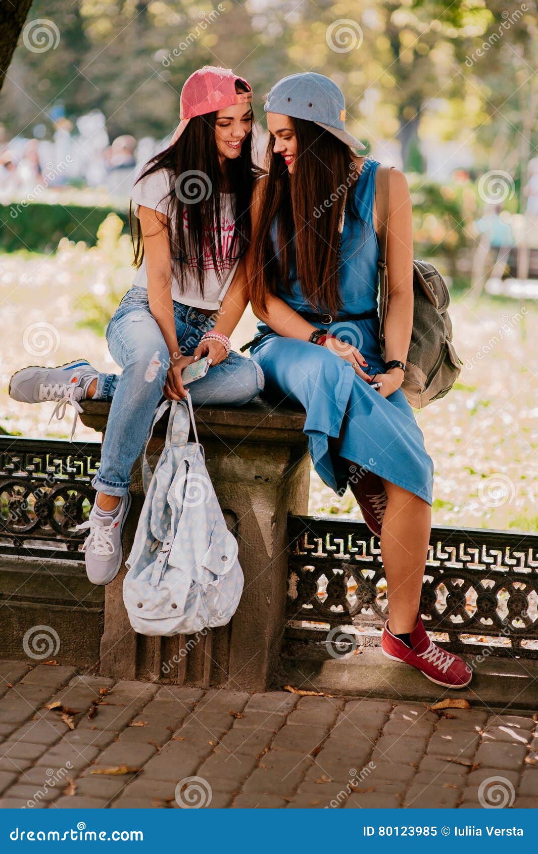 2 Beautiful Girls Rest on the Street Stock Image - Image of glance ...