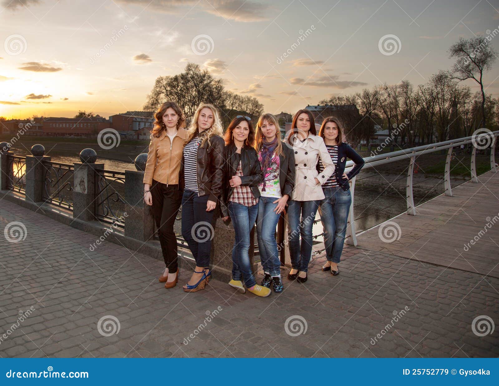Beautiful girls at sunset stock image. Image of city - 25752779