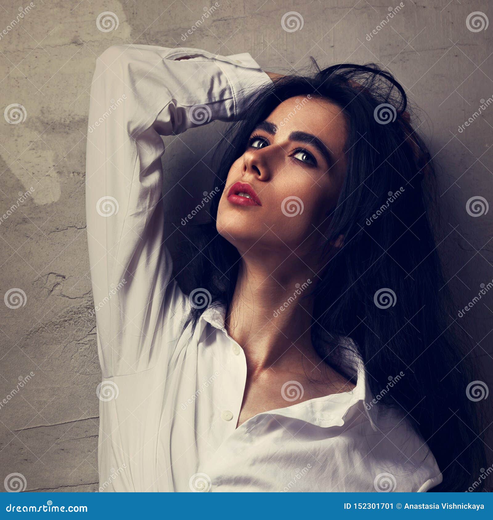 Beautiful Glamour Female Model With Long Black Hair Posing In White