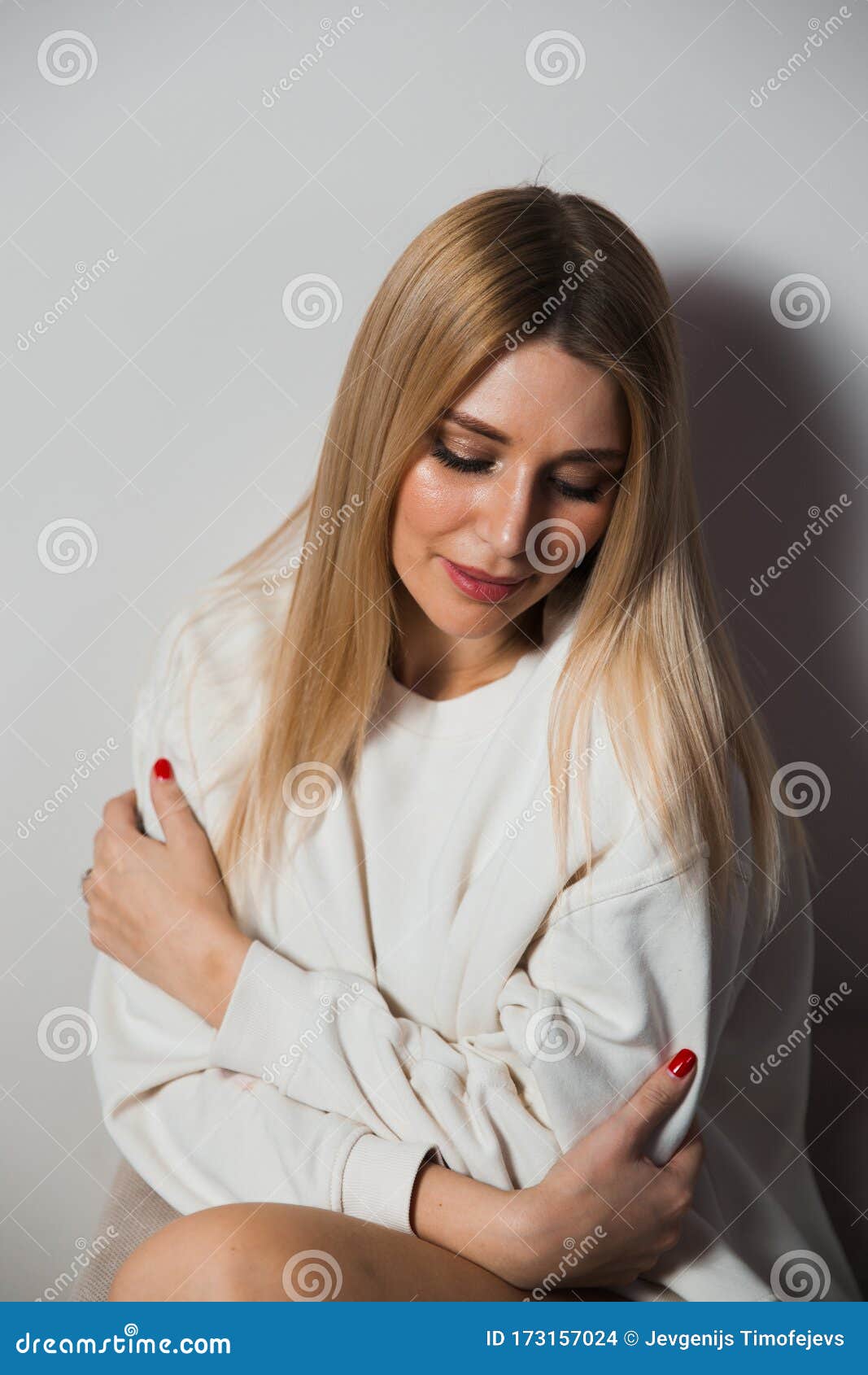 Beautiful Glamour Long Hair Woman Posing For Camera Photographer