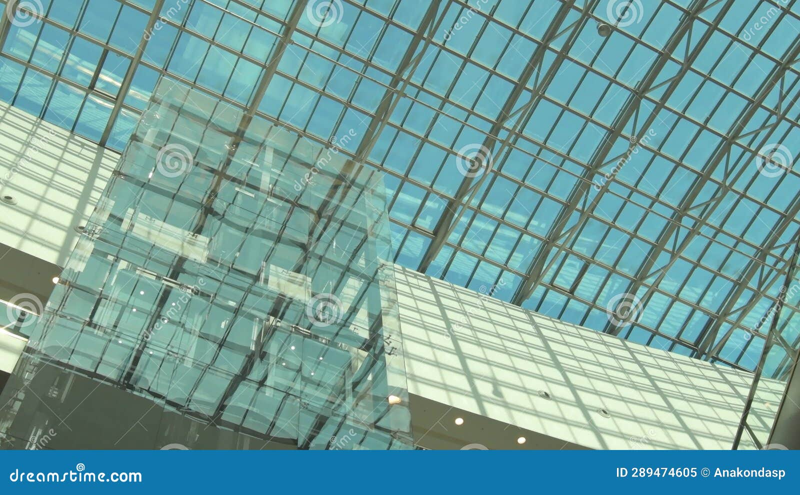 Beautiful Glass Ceiling and Elevator of Big Shopping Mall with Cloud ...