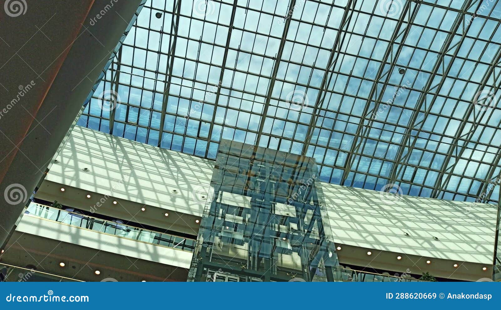 Beautiful Glass Ceiling and Elevator of Big Shopping Mall with Cloud ...