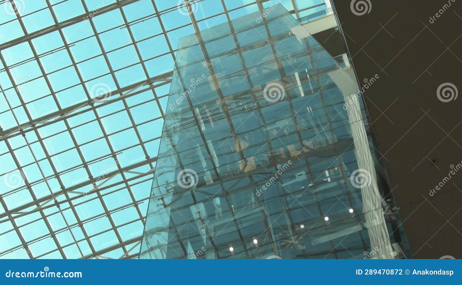 Beautiful Glass Ceiling and Elevator of Big Shopping Mall with Cloud ...