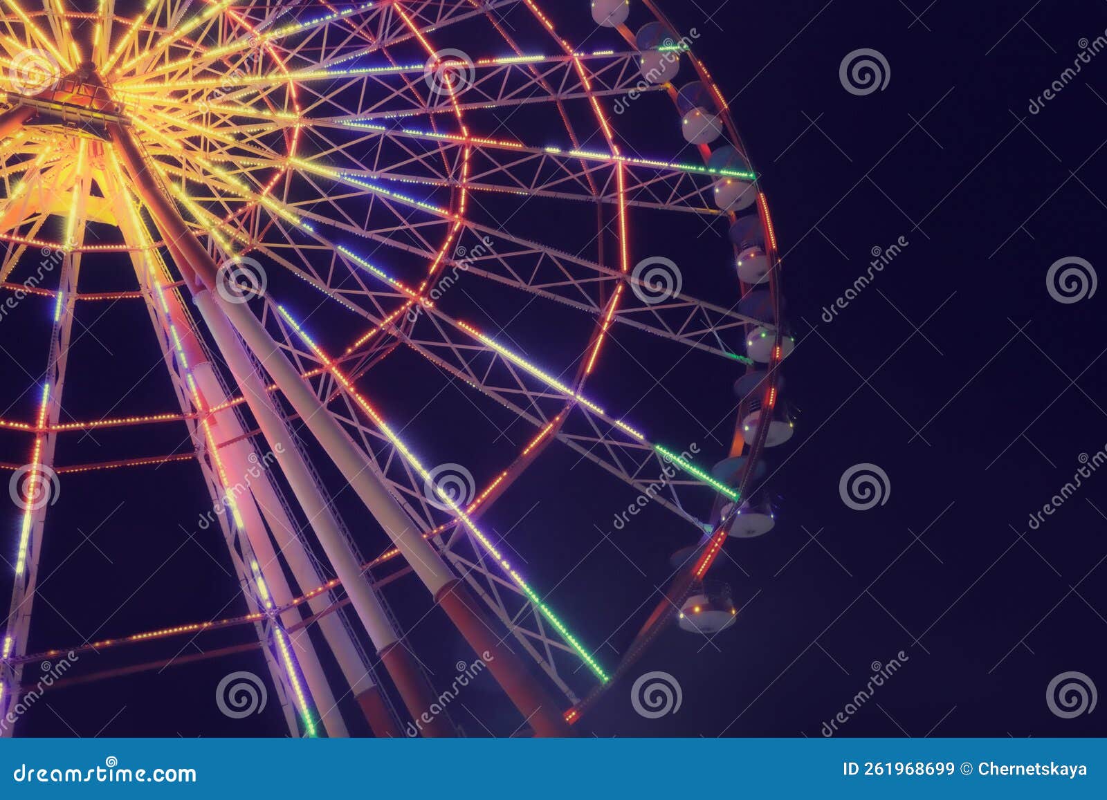 Beautiful Glowing Ferris Wheel Against Dark Sky, Low Angle View. Space ...
