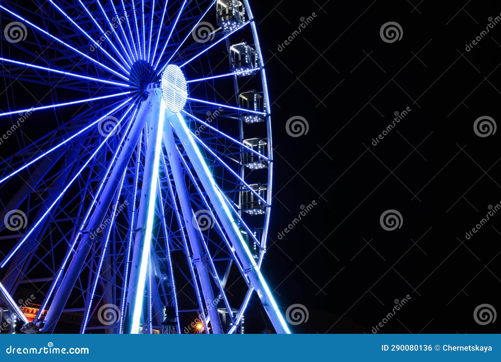 Beautiful Glowing Ferris Wheel Against Dark Sky. Space for Text Stock ...