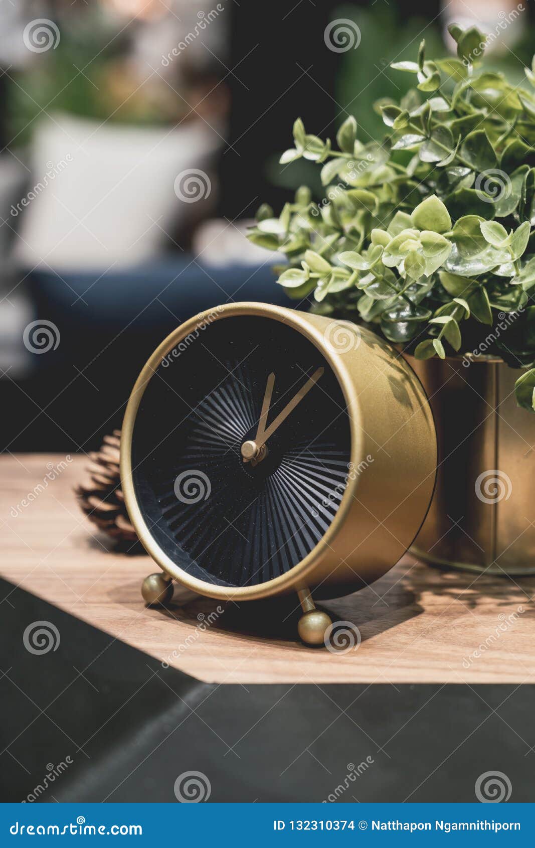 Beautiful golden clock stock photo. Image of houseplants - 132310374