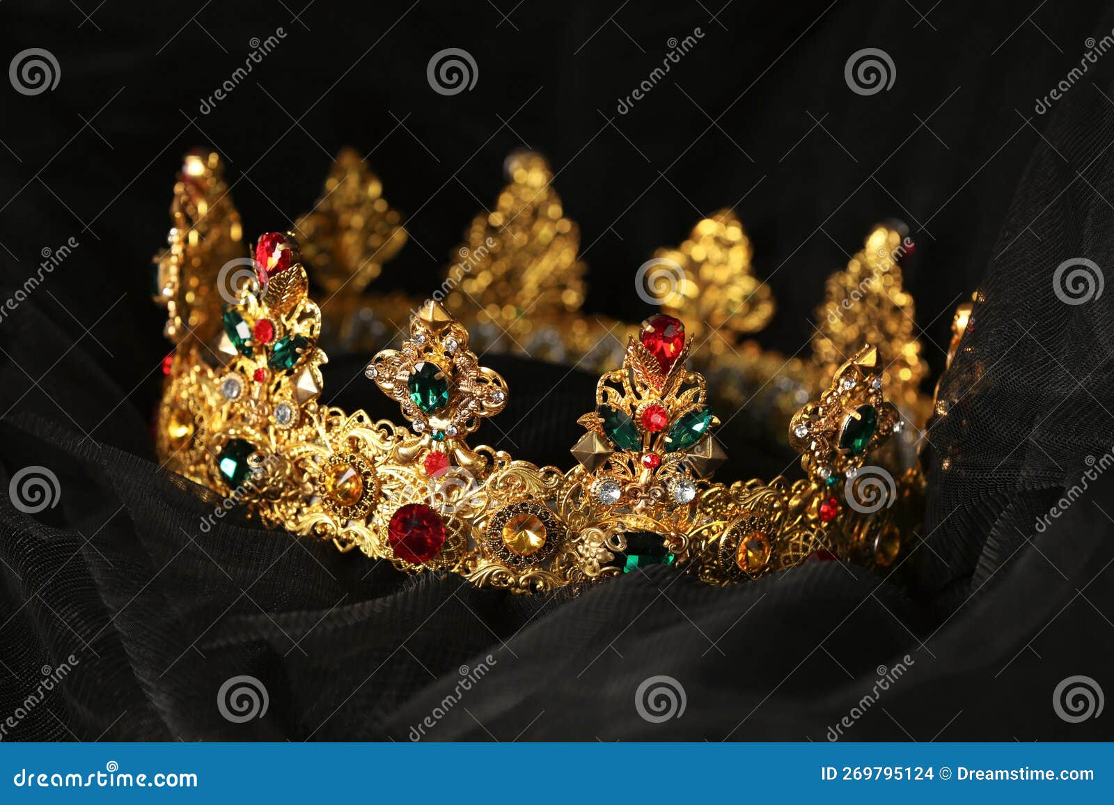 Beautiful Golden Crown with Gems on Black Cloth Stock Photo - Image of ...