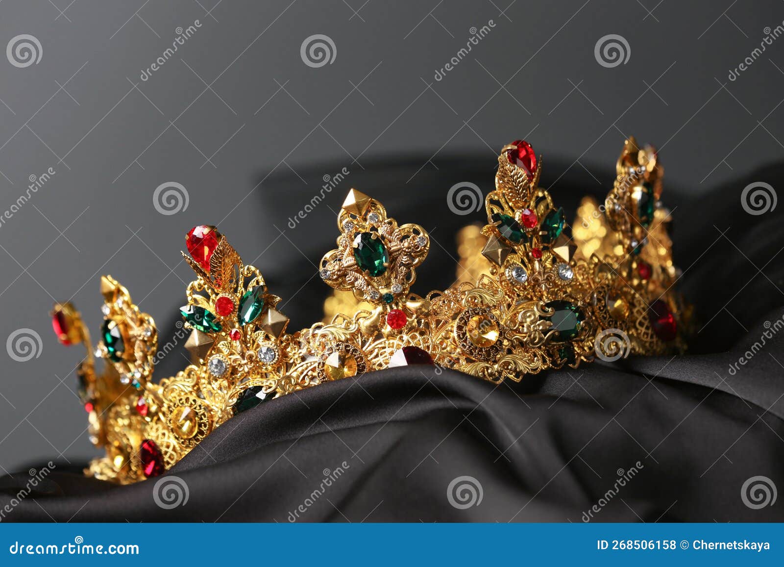 Beautiful Golden Crown with Gems on Dark Cloth Stock Photo - Image of ...