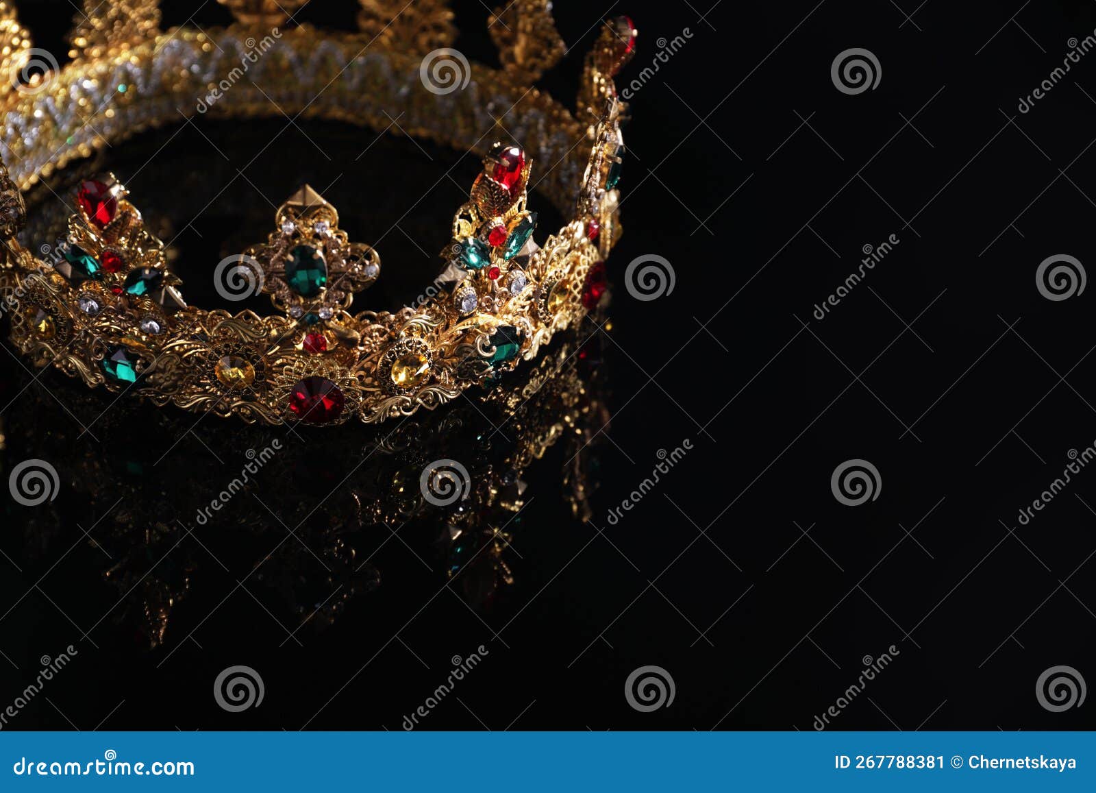 Beautiful Golden Crown with Gems on Dark Mirror Surface, Closeup. Space ...