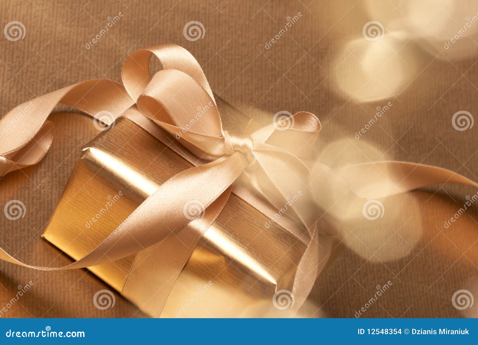 Beautiful golden gift stock photo. Image of personal - 12548354