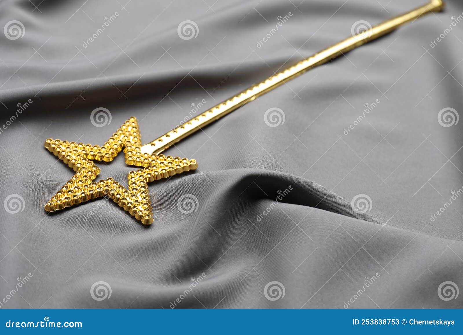 Beautiful Golden Magic Wand on Grey Fabric Stock Image - Image of ...