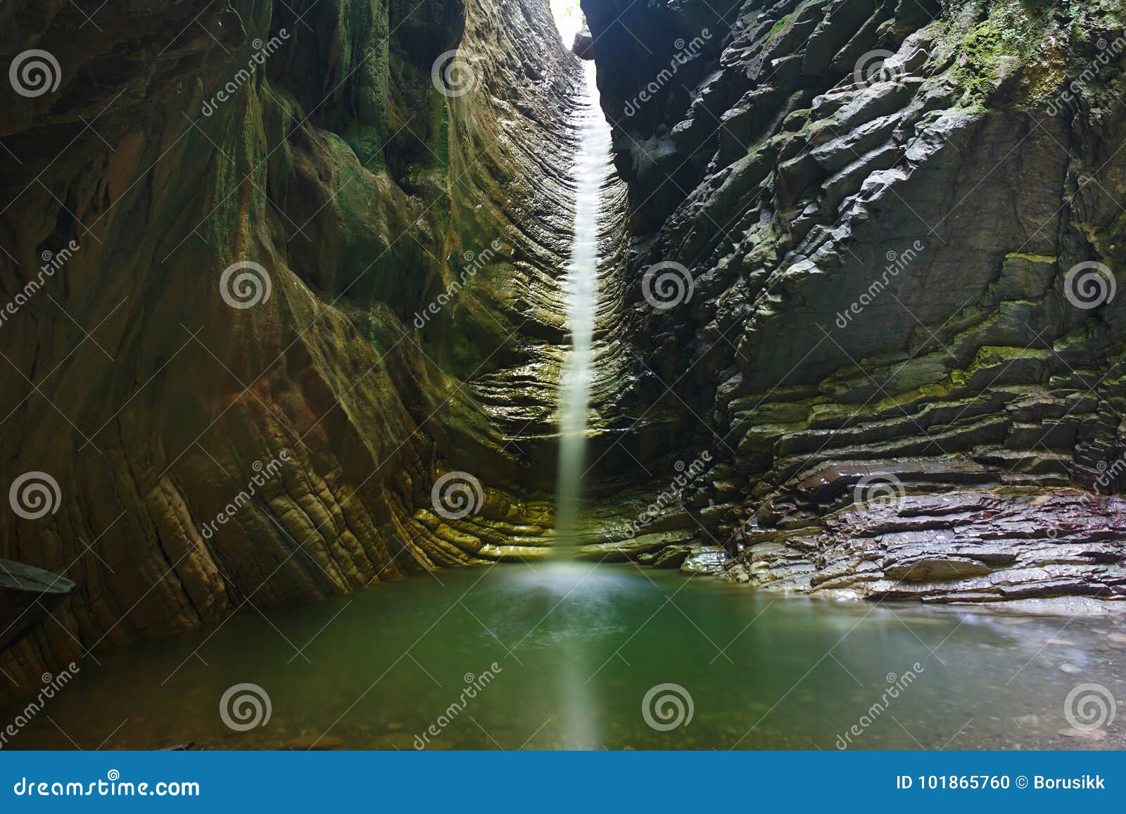 Beautiful Grotto with Pouring Beautiful Waterfall Stock Photo - Image ...
