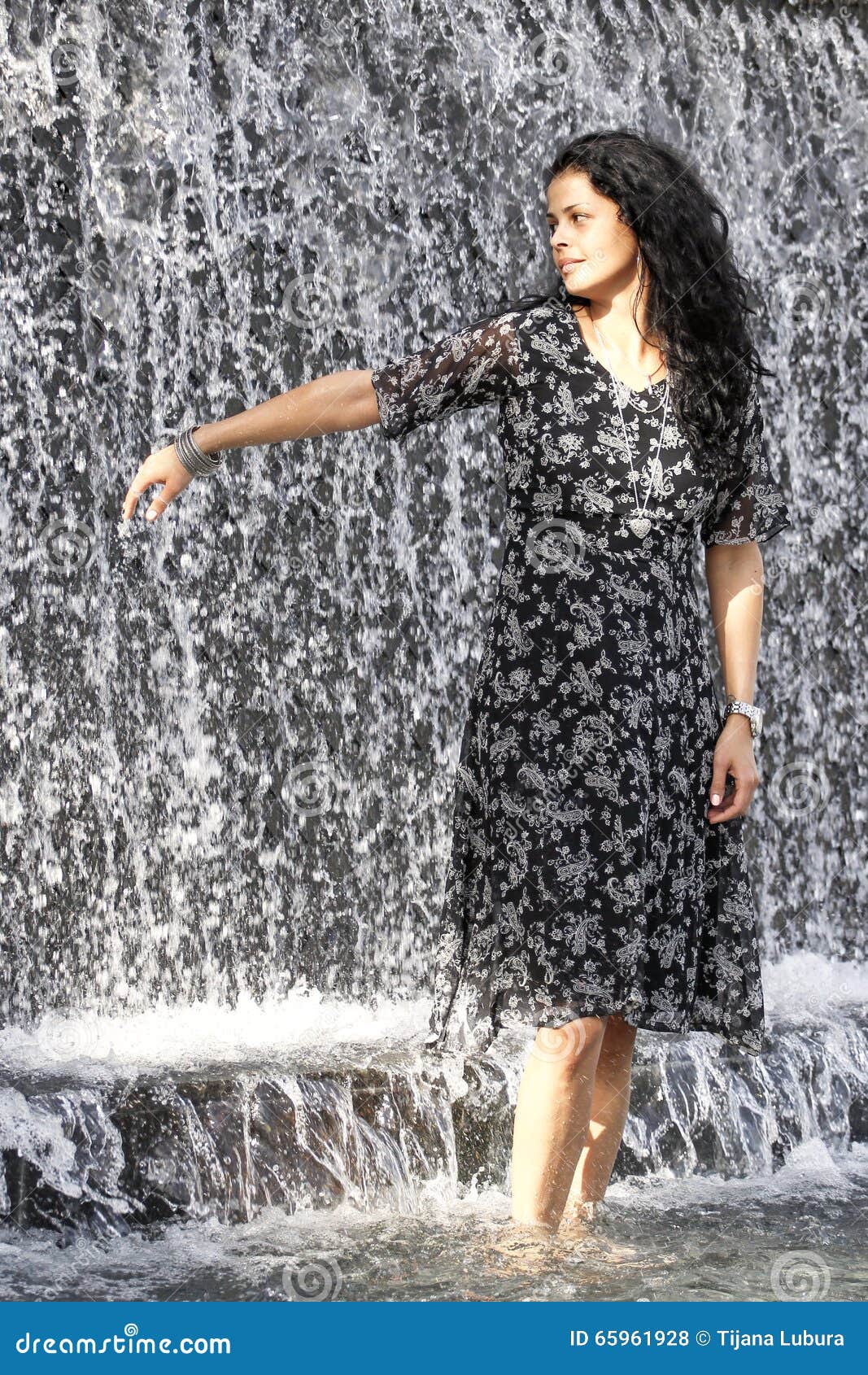 Beautiful Girl and a Waterfall Stock Photo - Image of fashion, dress ...