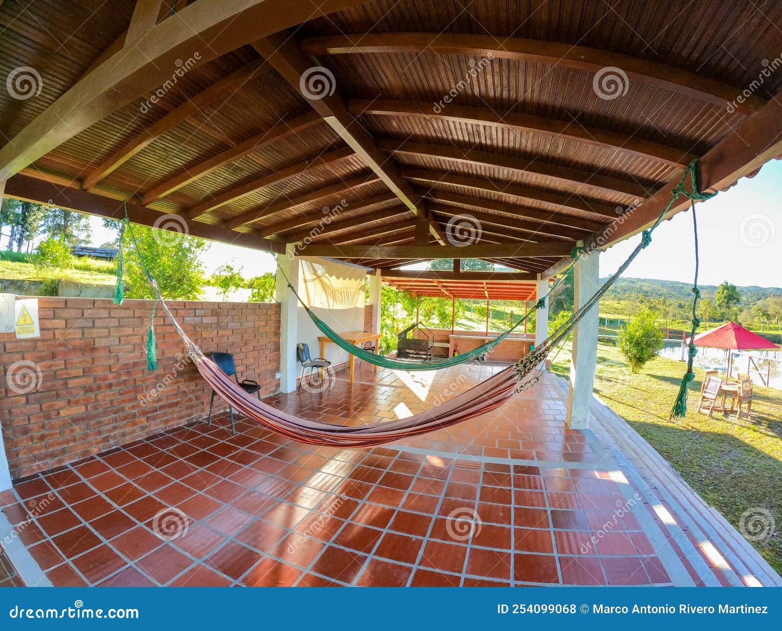 Beautiful Hammocks in the Middle of a Cabin Stock Photo - Image of ...