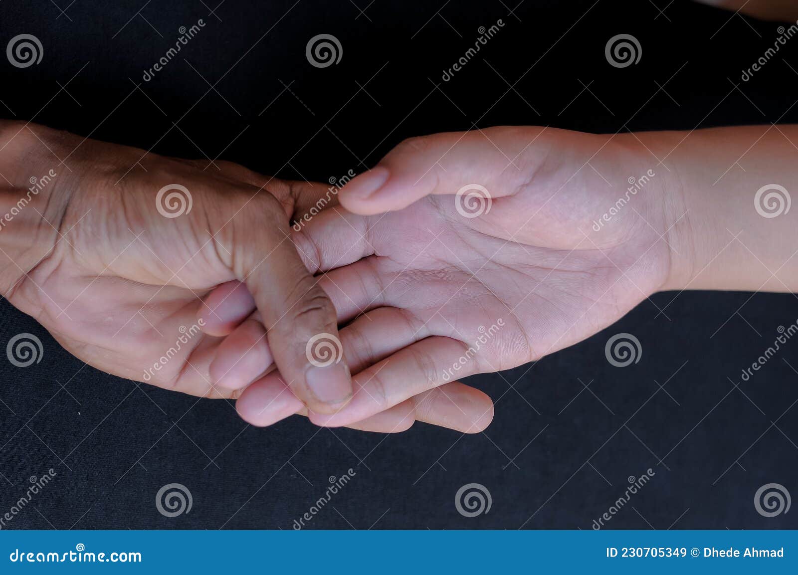 Holding Hands Beautiful and Lying on the Black Table Stock Image ...
